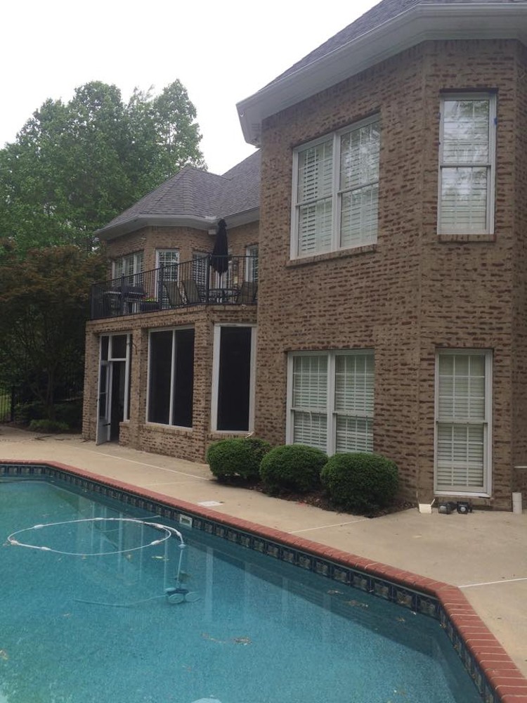 Mortar washed brick house by SouthFace Renovations LLC in Greystone, Al