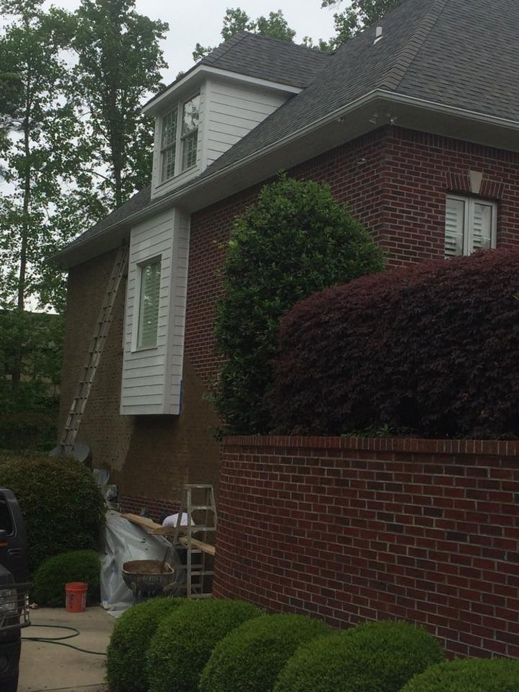 Mortar washed brick house by SouthFace Renovations LLC in Greystone, Al