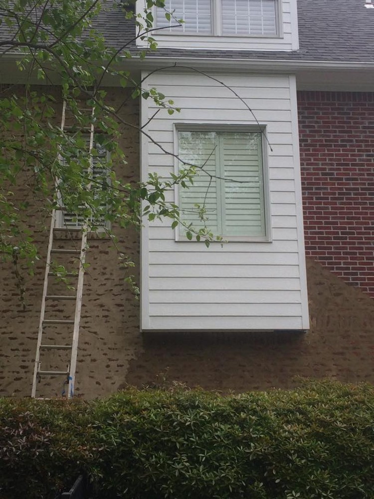 Mortar washed brick house by SouthFace Renovations LLC in Greystone, Al