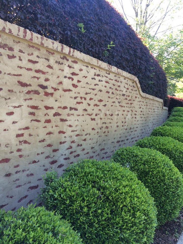 Mortar washed brick house by SouthFace Renovations LLC in Greystone, Al