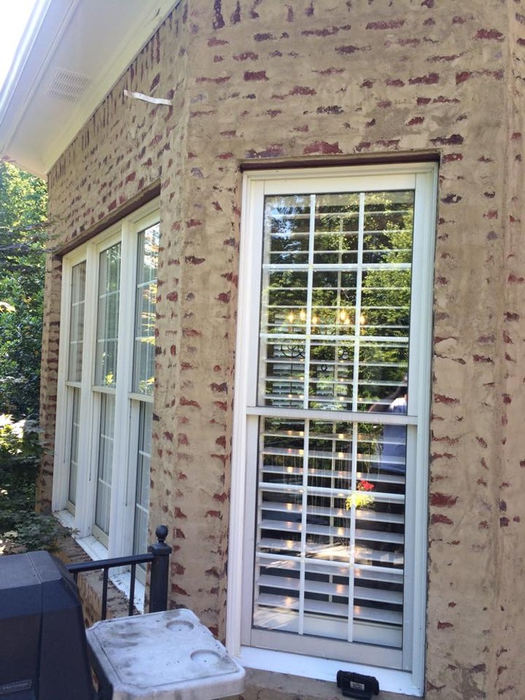 Mortar washed brick house by SouthFace Renovations LLC in Greystone, Al